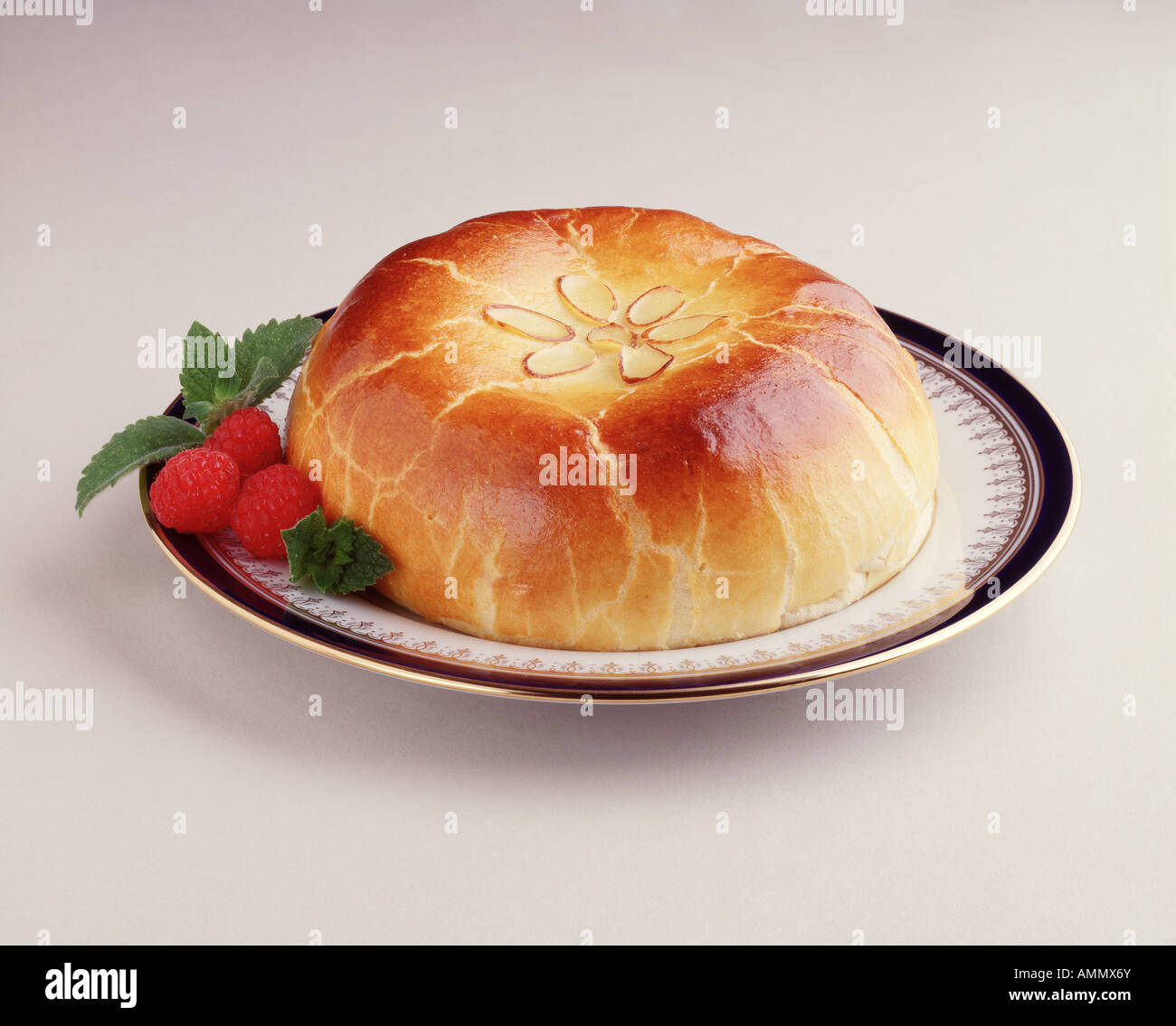 Raspberry Brie cheese formal china plate Stock Photo - Alamy