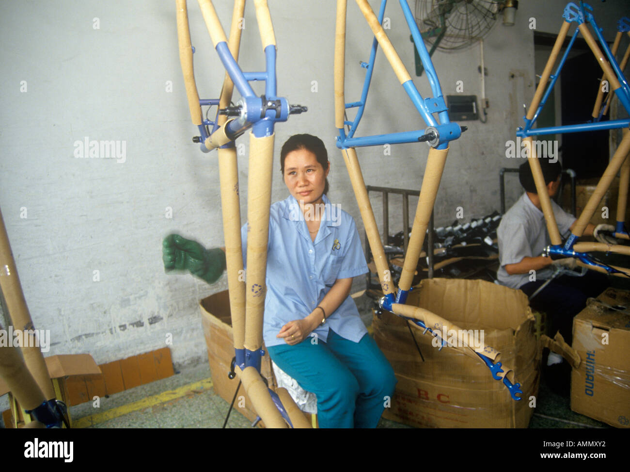 Factory workers at China Bicycle in Shenzhen in Guangdong Province ...
