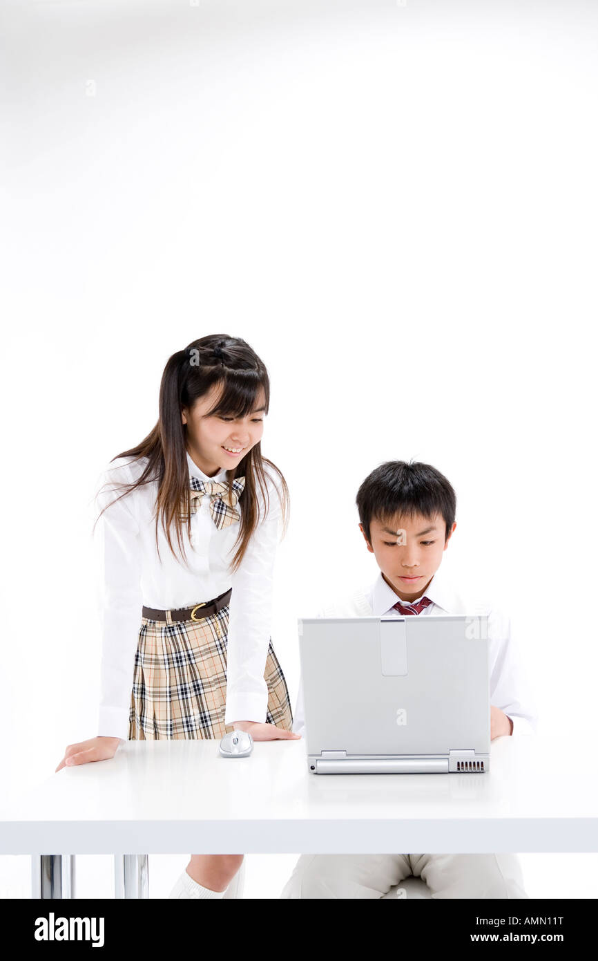 Middle school students using computer Stock Photo - Alamy