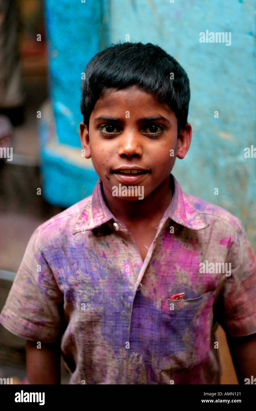 a small indian at holi in varanasi Stock Photo - Alamy