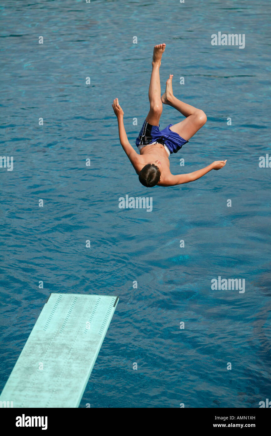 A boy jumping into the water Stock Photo - Alamy