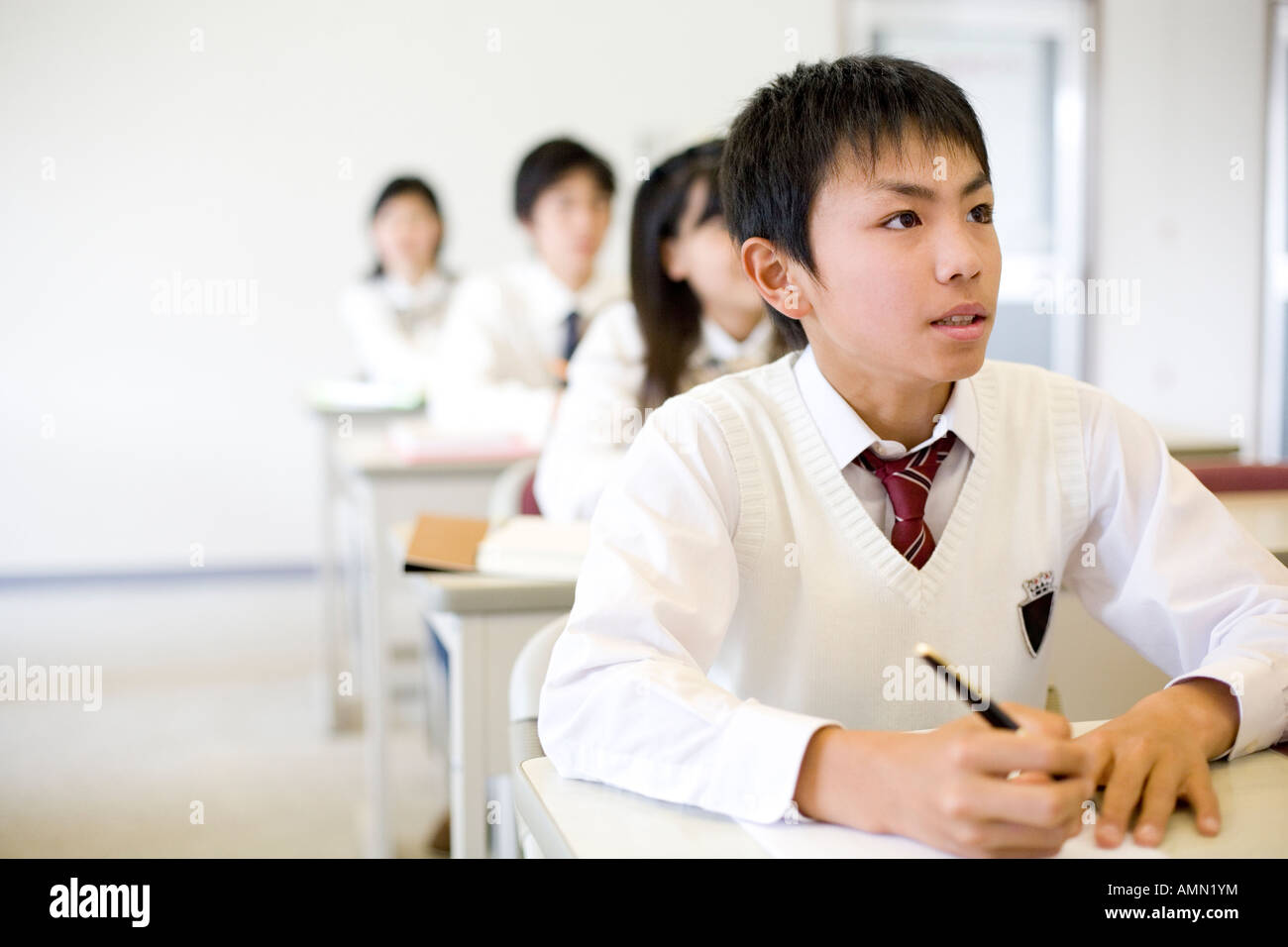 Middle school students studying Stock Photo - Alamy