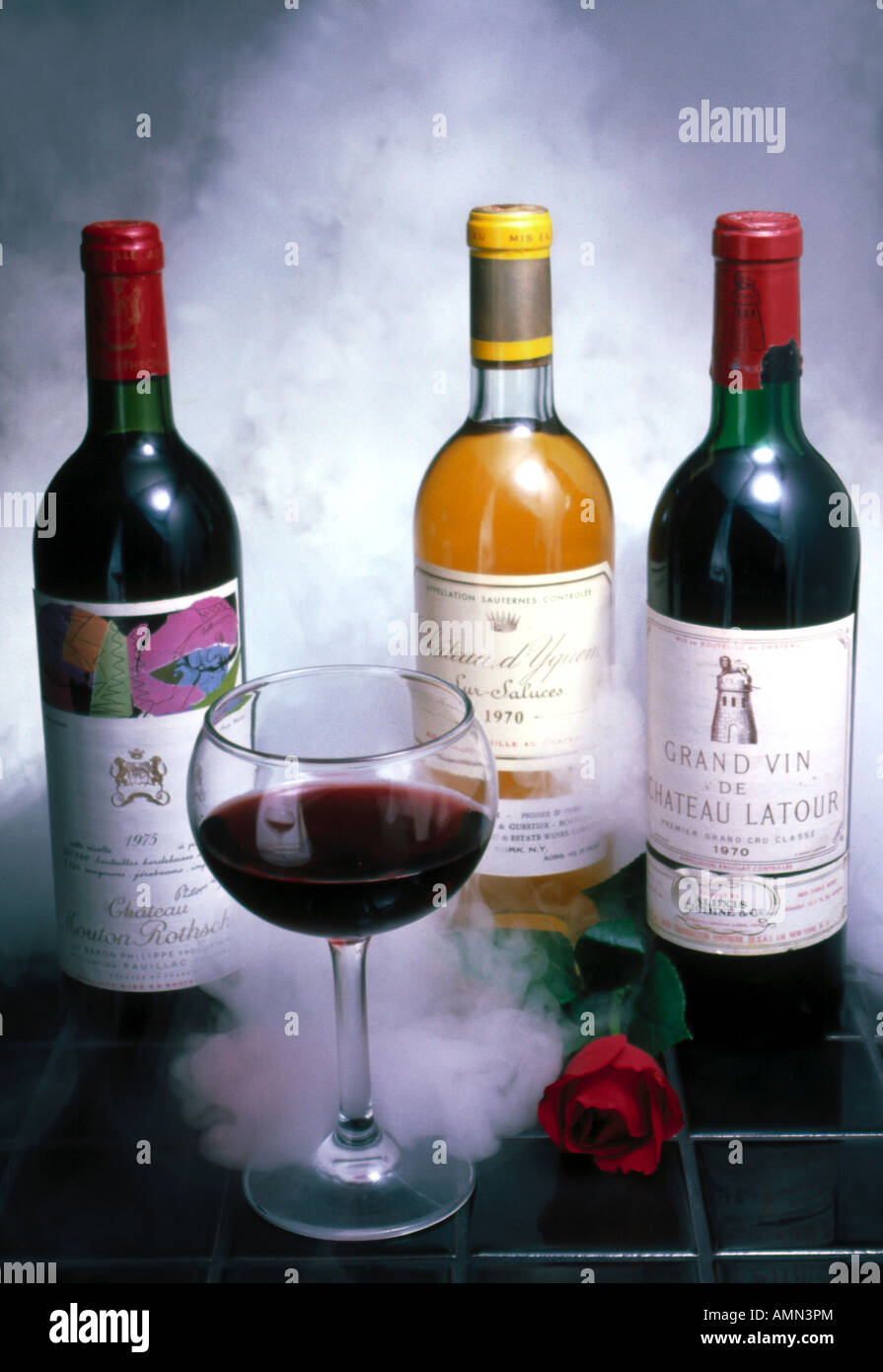 Three wine bottles Stock Photo - Alamy