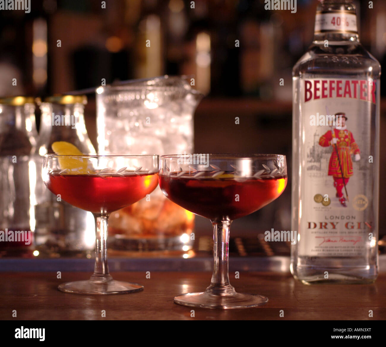 Beefeater dry gin and cocktail glasses Stock Photo - Alamy