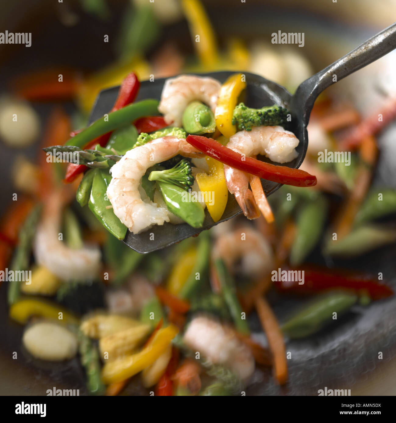 Prawn stir fry in wok Stock Photo - Alamy