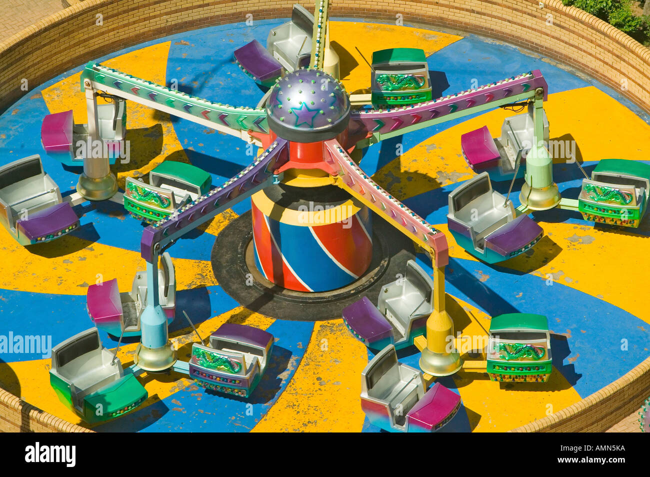 Elevated view of brightly colored carnival car rides in Durban South ...