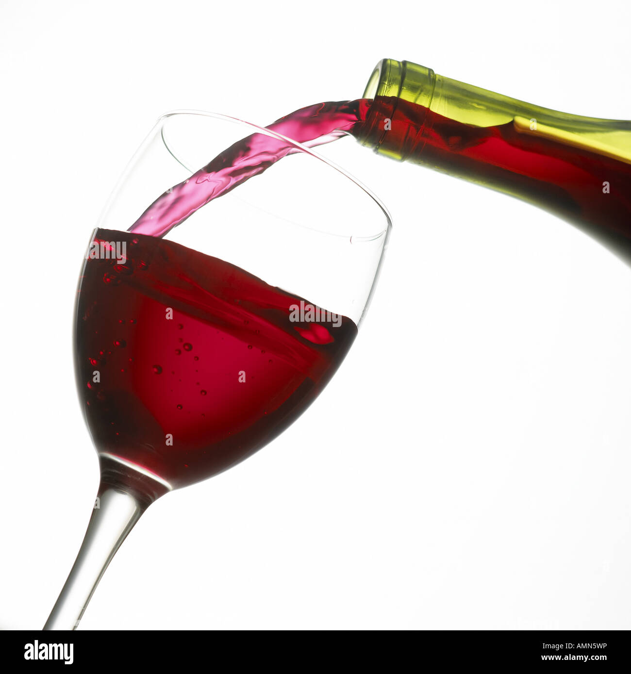 Pouring red wine Stock Photo - Alamy