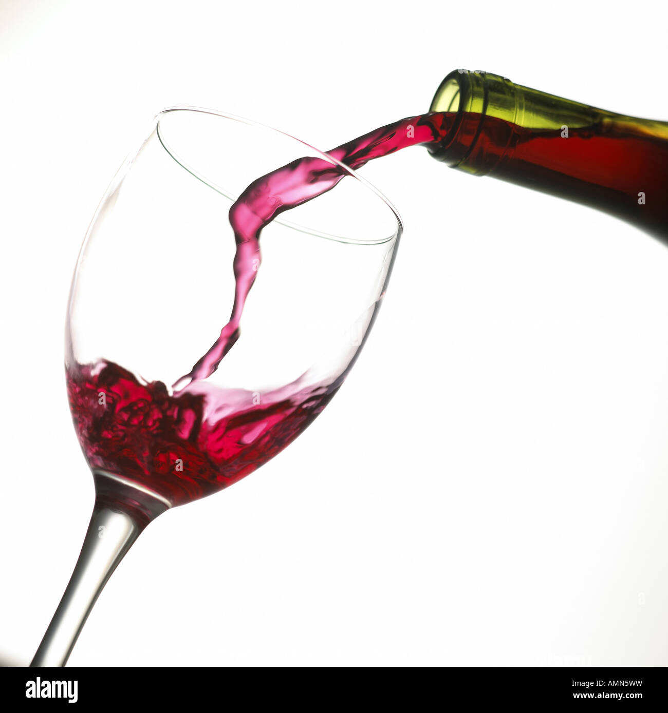 Pouring red wine Stock Photo - Alamy
