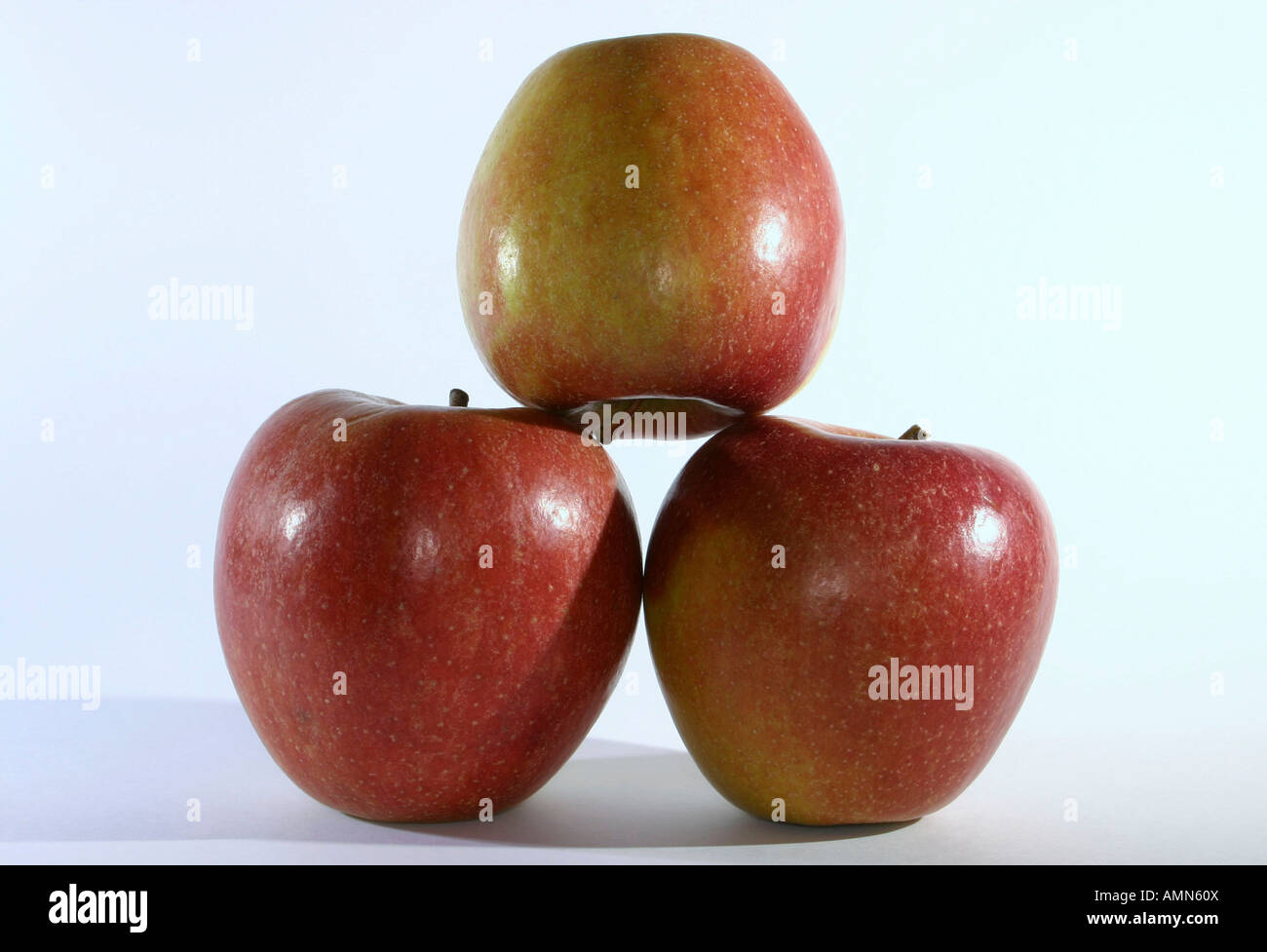 Stack of three apples Stock Photo - Alamy