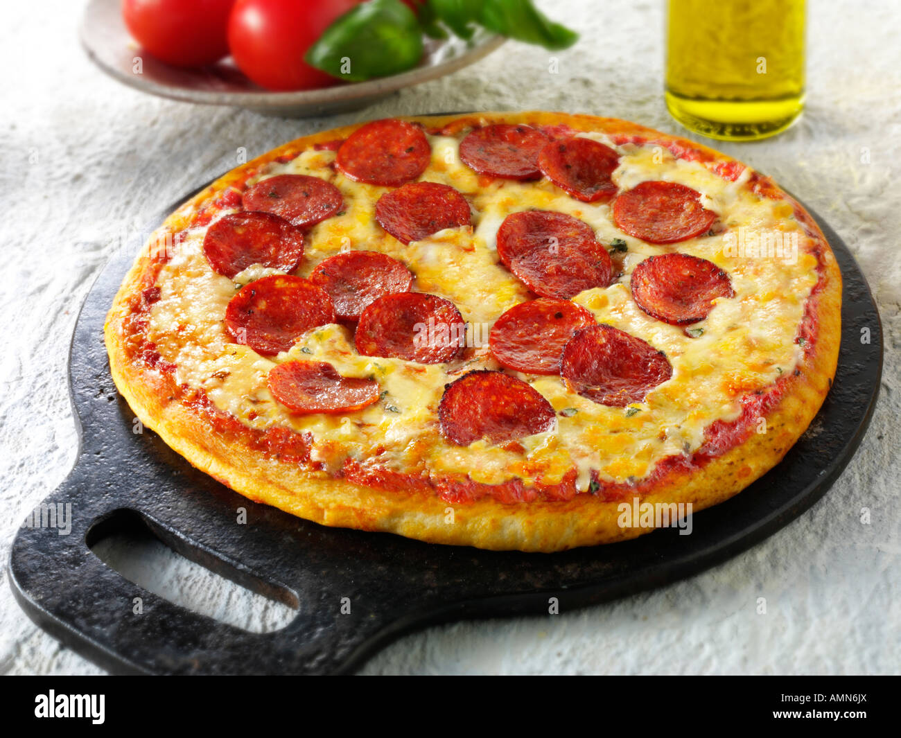Whole pizza topped with pepperoni Stock Photo - Alamy