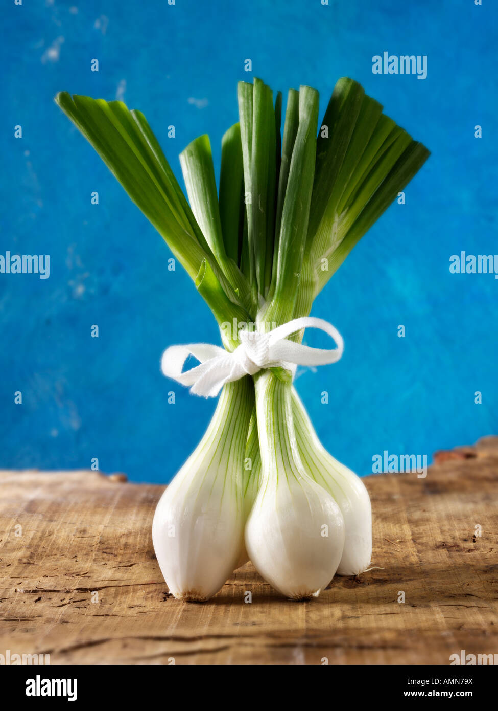 Spring onion bunch Stock Photo - Alamy