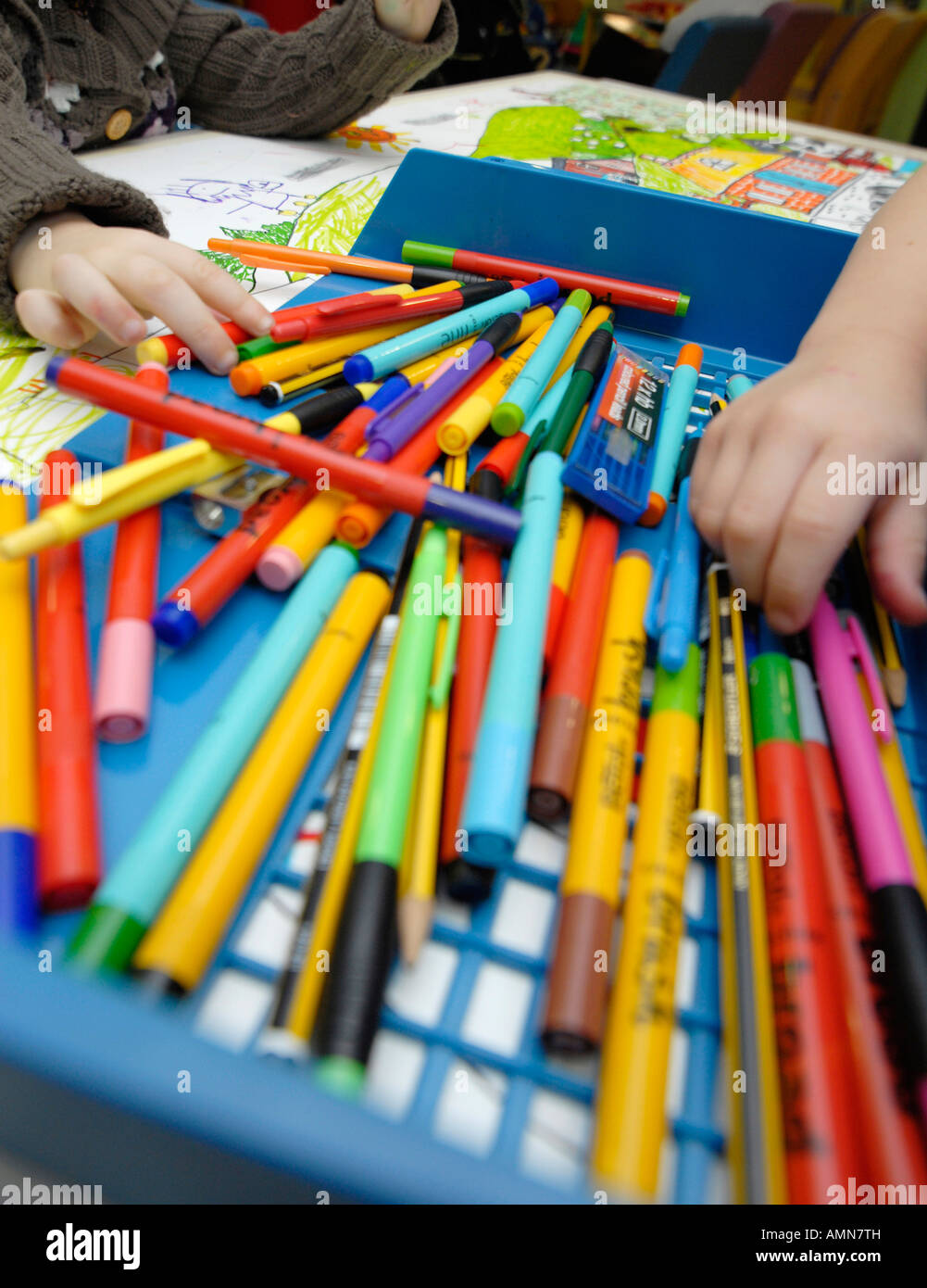 coloured pens and young artists at work Stock Photo - Alamy