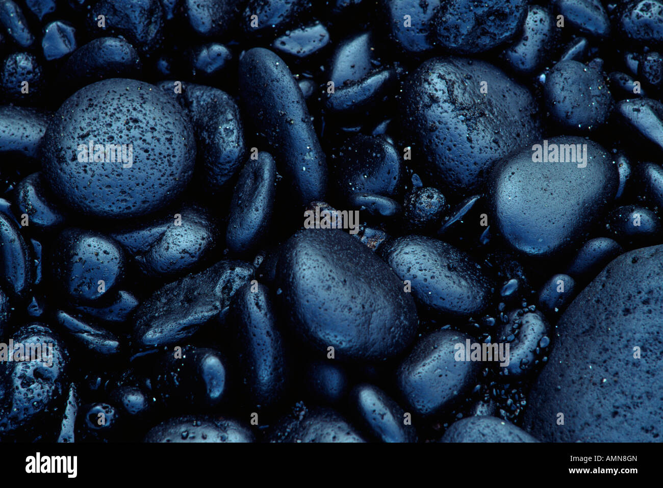 Black round rock hi-res stock photography and images - Alamy