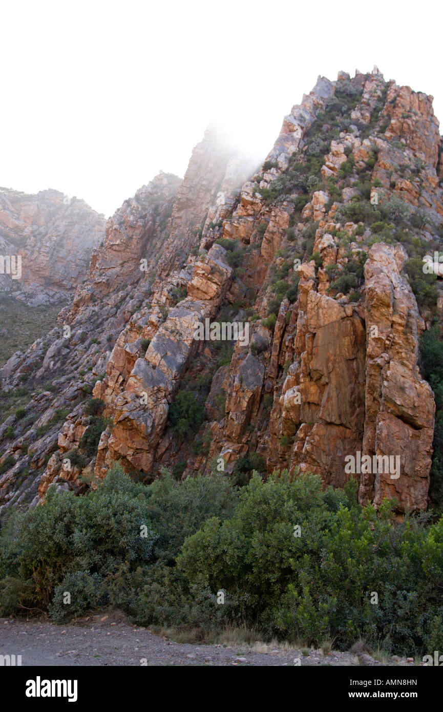 Dramatic geological fold rock formations in the Seweweekspoort where a ...
