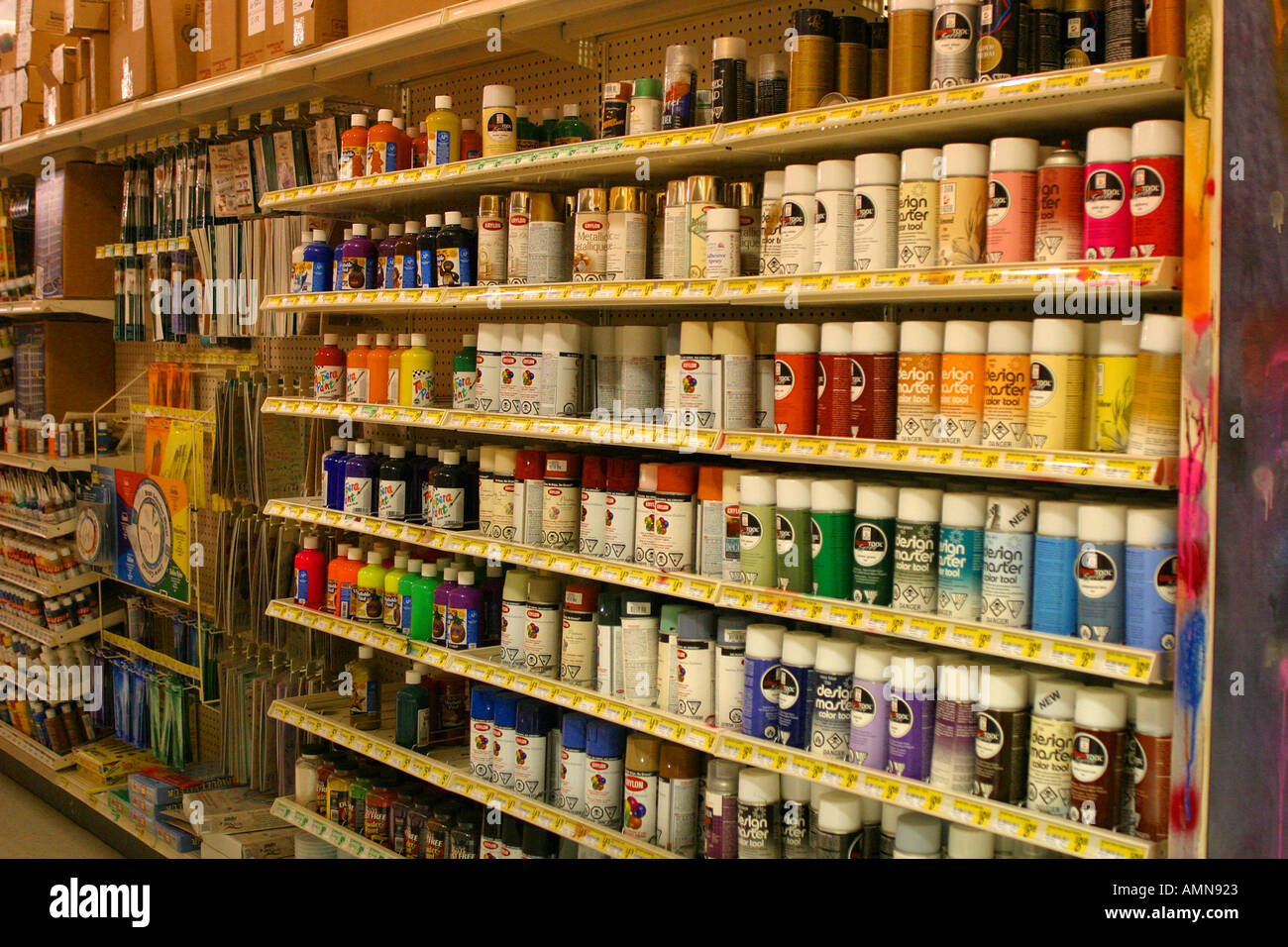 Shelf full of merchandise Stock Photo - Alamy