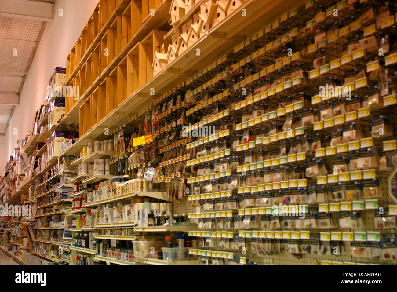 Shelf full of merchandise Stock Photo - Alamy