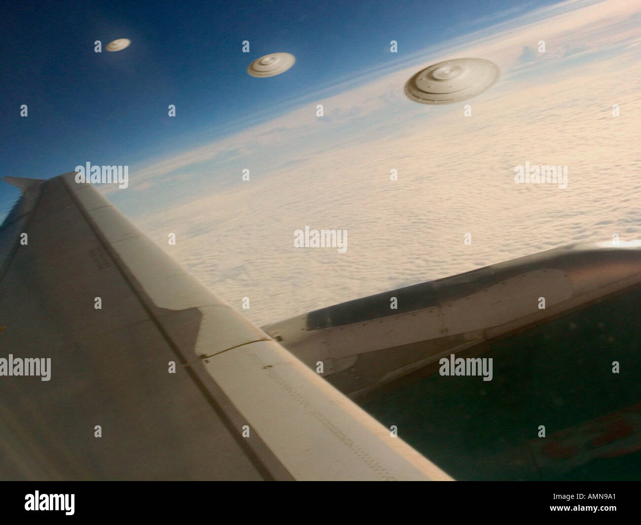 UFO sighting our airplane window Stock Photo - Alamy