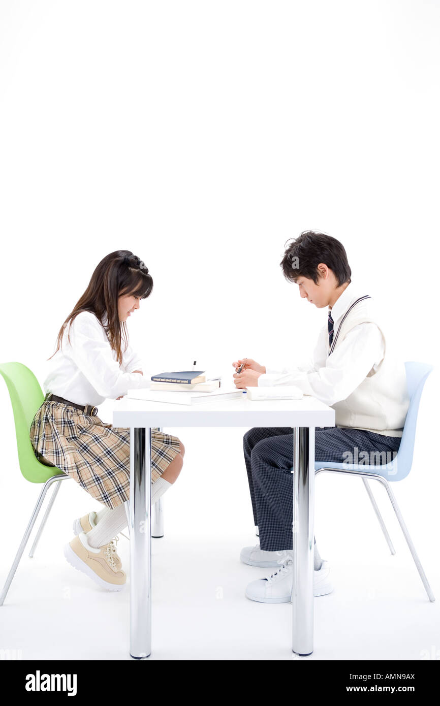 Middle school students studying Stock Photo - Alamy