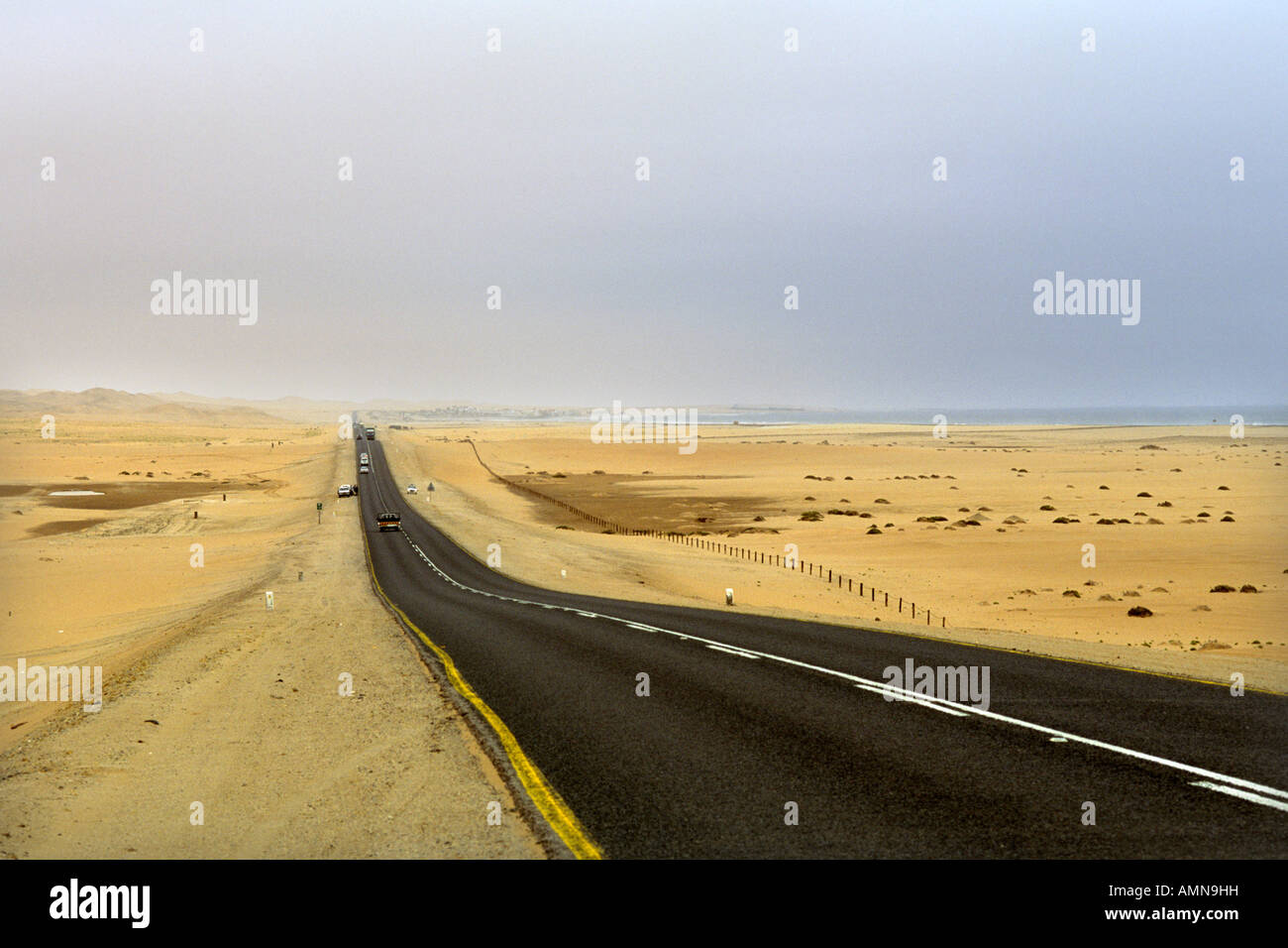 A tar road stretching into the distance through the desert near Walvis ...