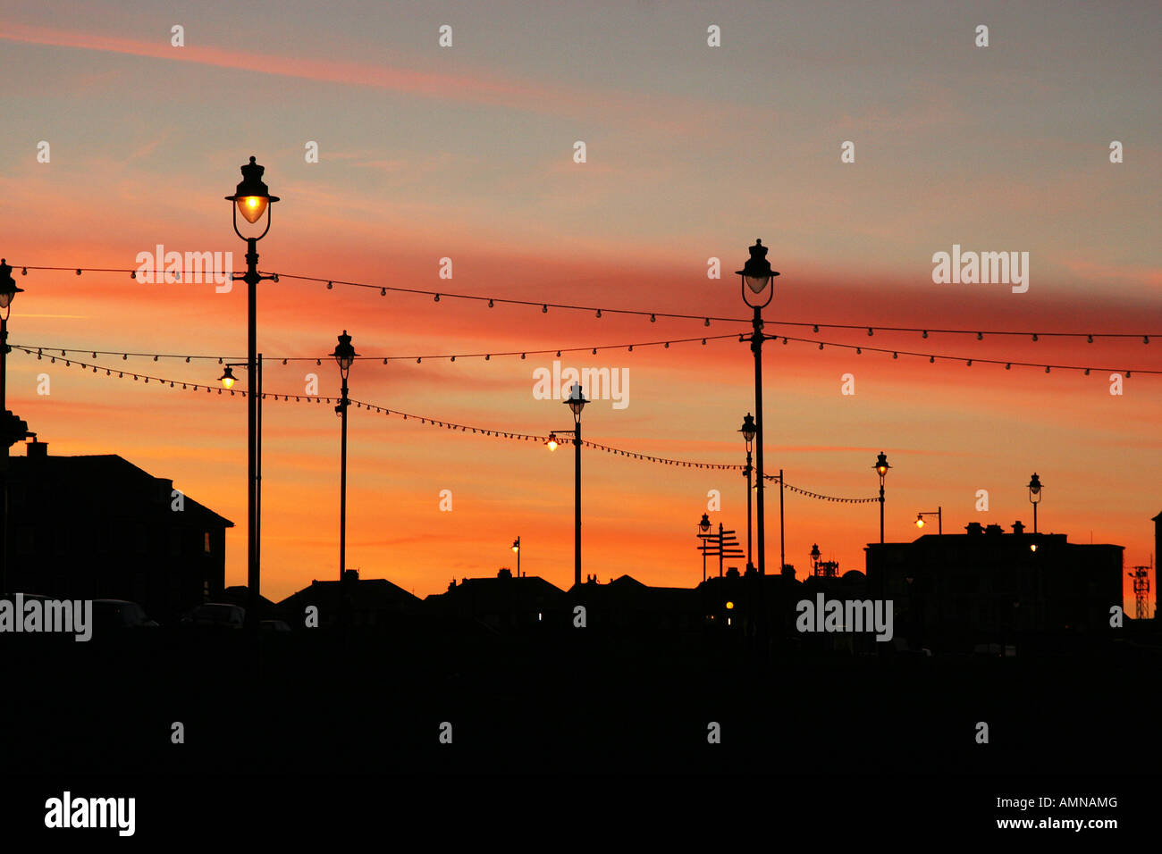 Sunset with street lights in Whitby Stock Photo - Alamy