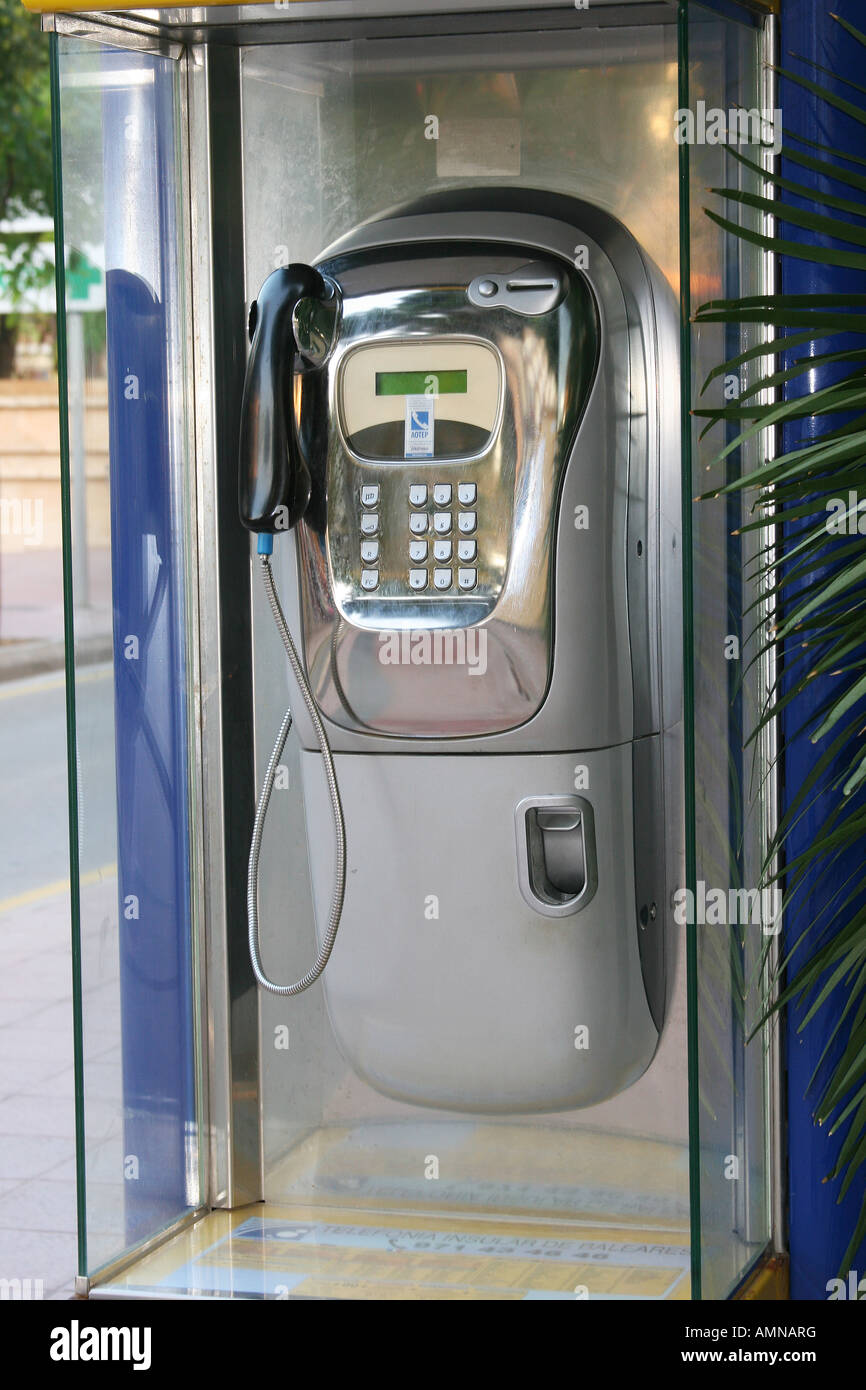 Modern street outdoor public telephone in Palma Nova Stock Photo - Alamy