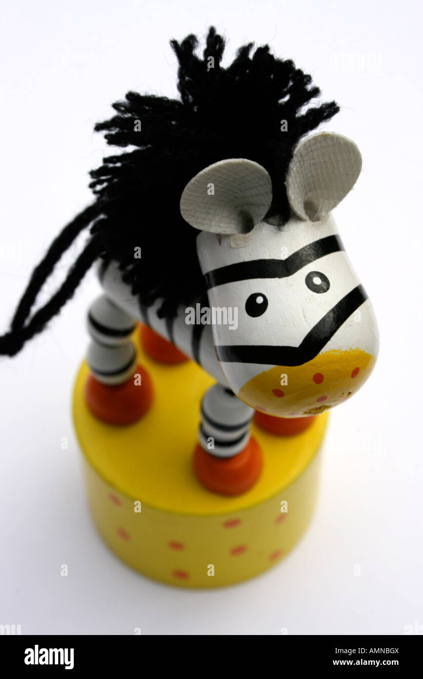 Childrens toy zebra on white background Stock Photo - Alamy