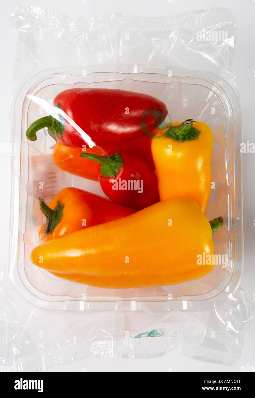 Packed bell peppers on white background Stock Photo - Alamy