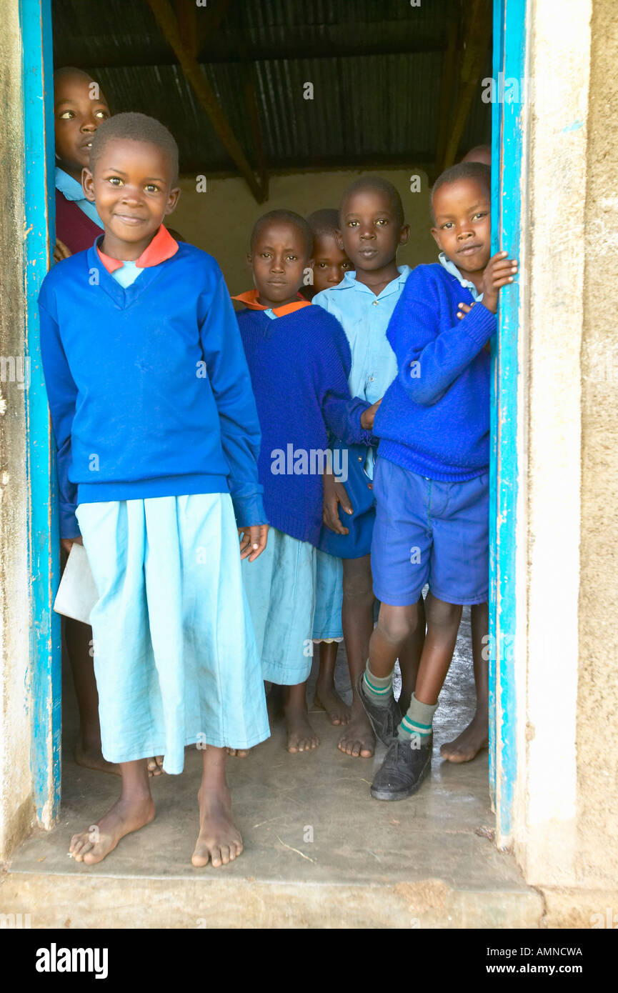 School children in blue uniforms hi-res stock photography and images ...