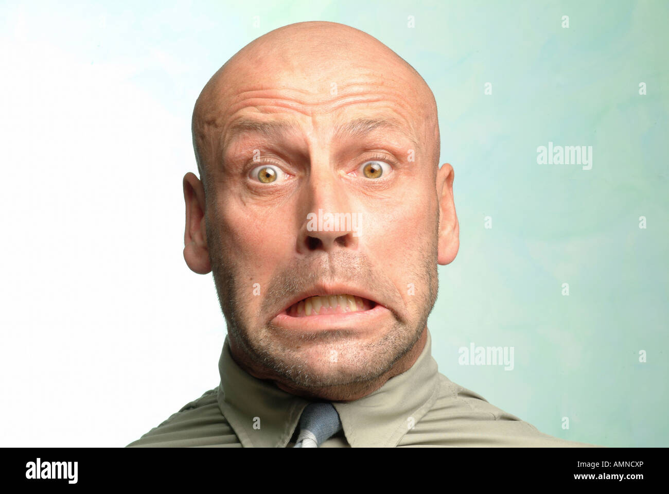 Man with a scared look on his face Stock Photo - Alamy
