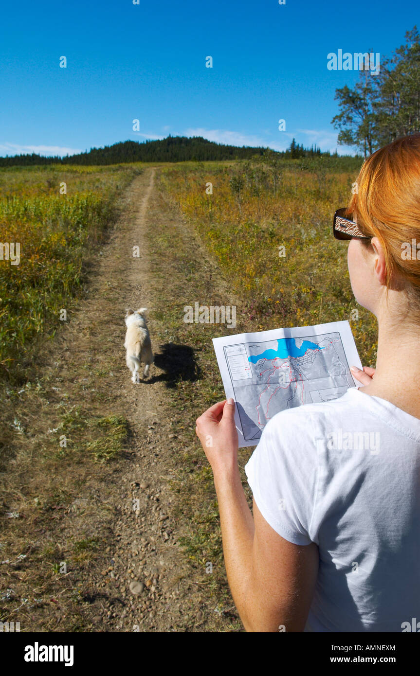 Hiker Looking at Map Stock Photo - Alamy