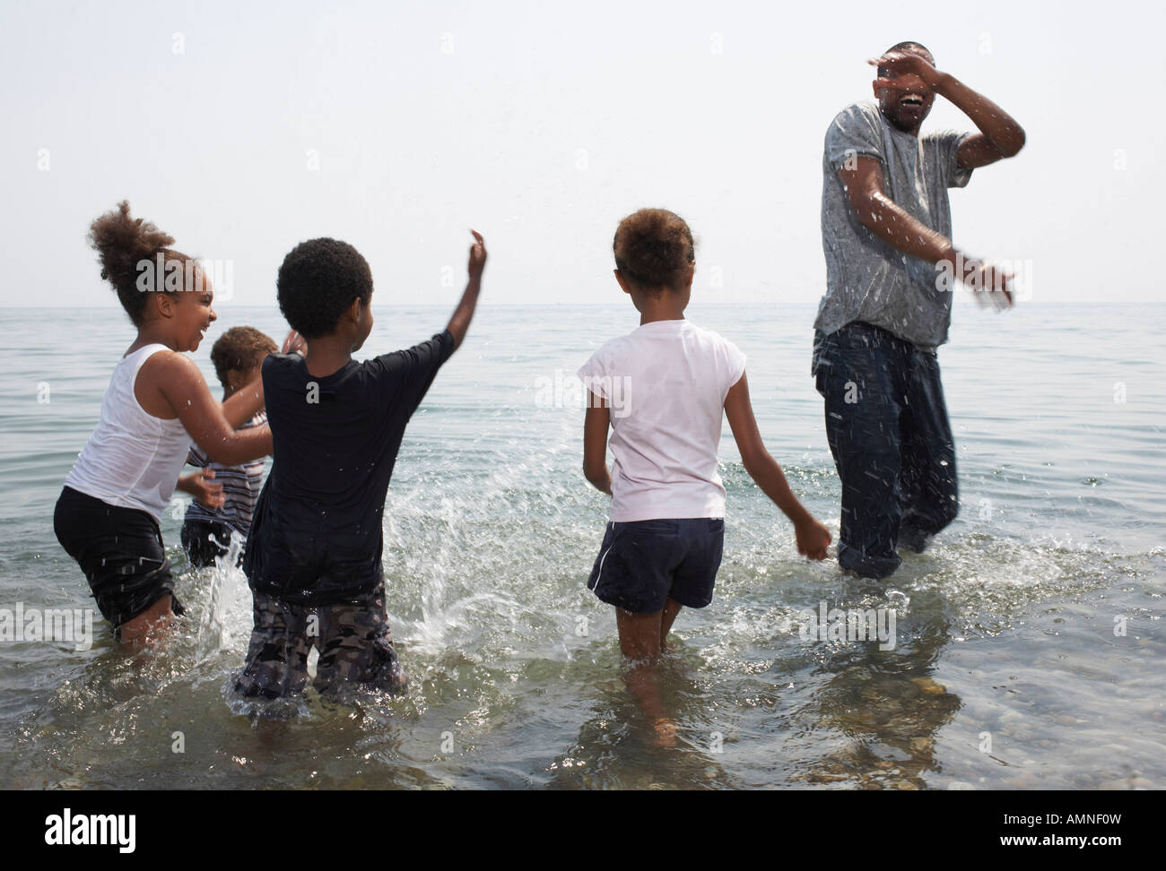 Little Girl Splashing High Resolution Stock Photography and Images - Alamy
