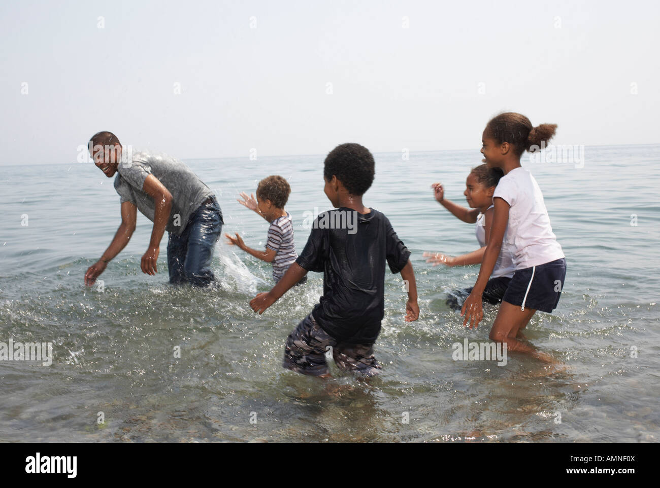 Little Girl Splashing High Resolution Stock Photography and Images - Alamy
