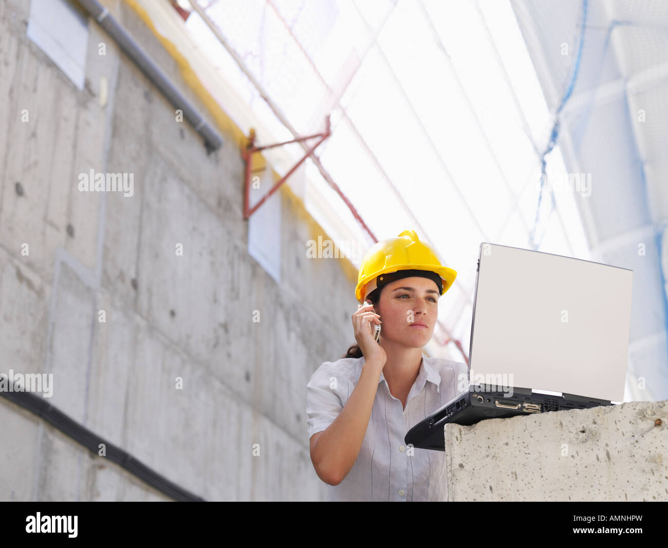 Young adults construction site talking hi-res stock photography and ...