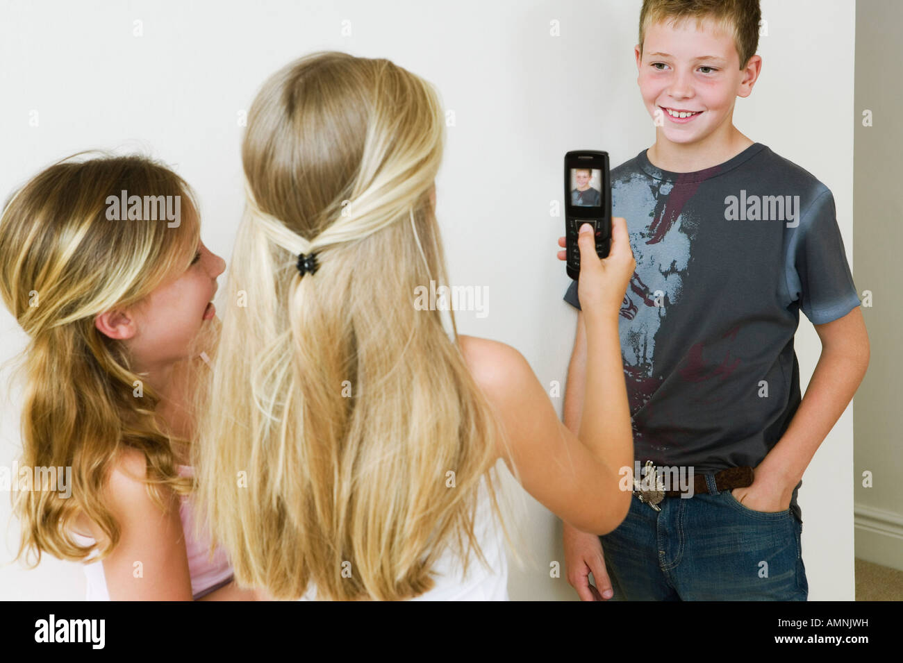 Kids Using Camera Phone Stock Photo - Alamy
