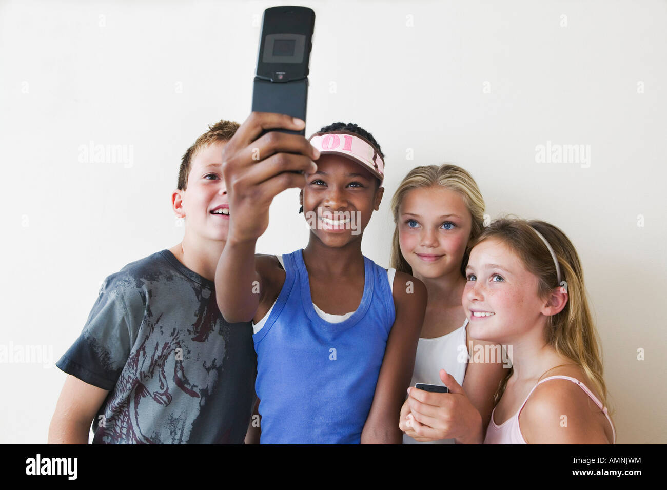 Kids Using Camera Phone Stock Photo - Alamy