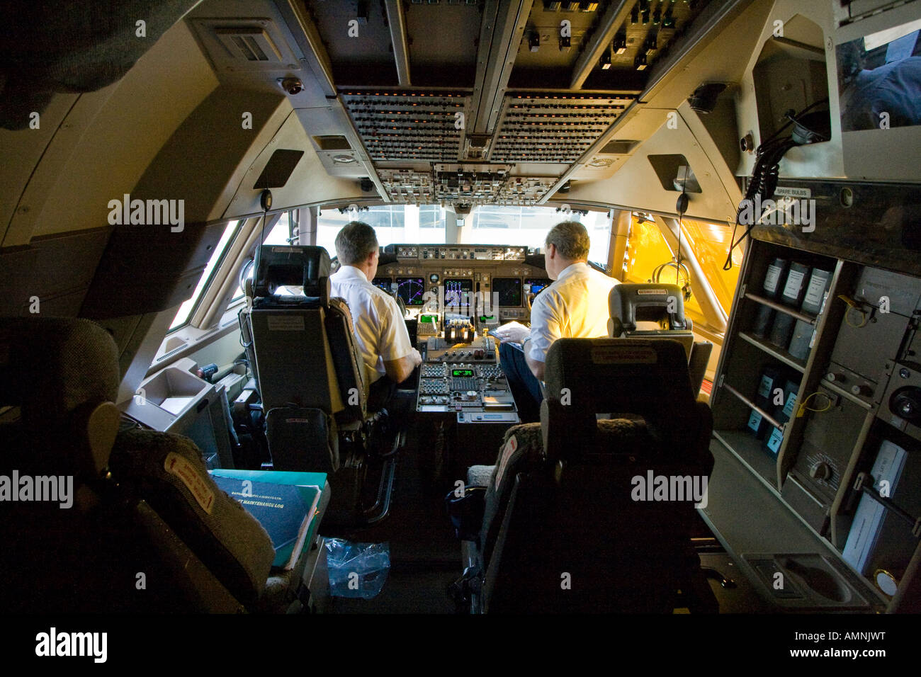 Captain and Crew in the Cockpit of a Cathay Airway 747 Boeing ...