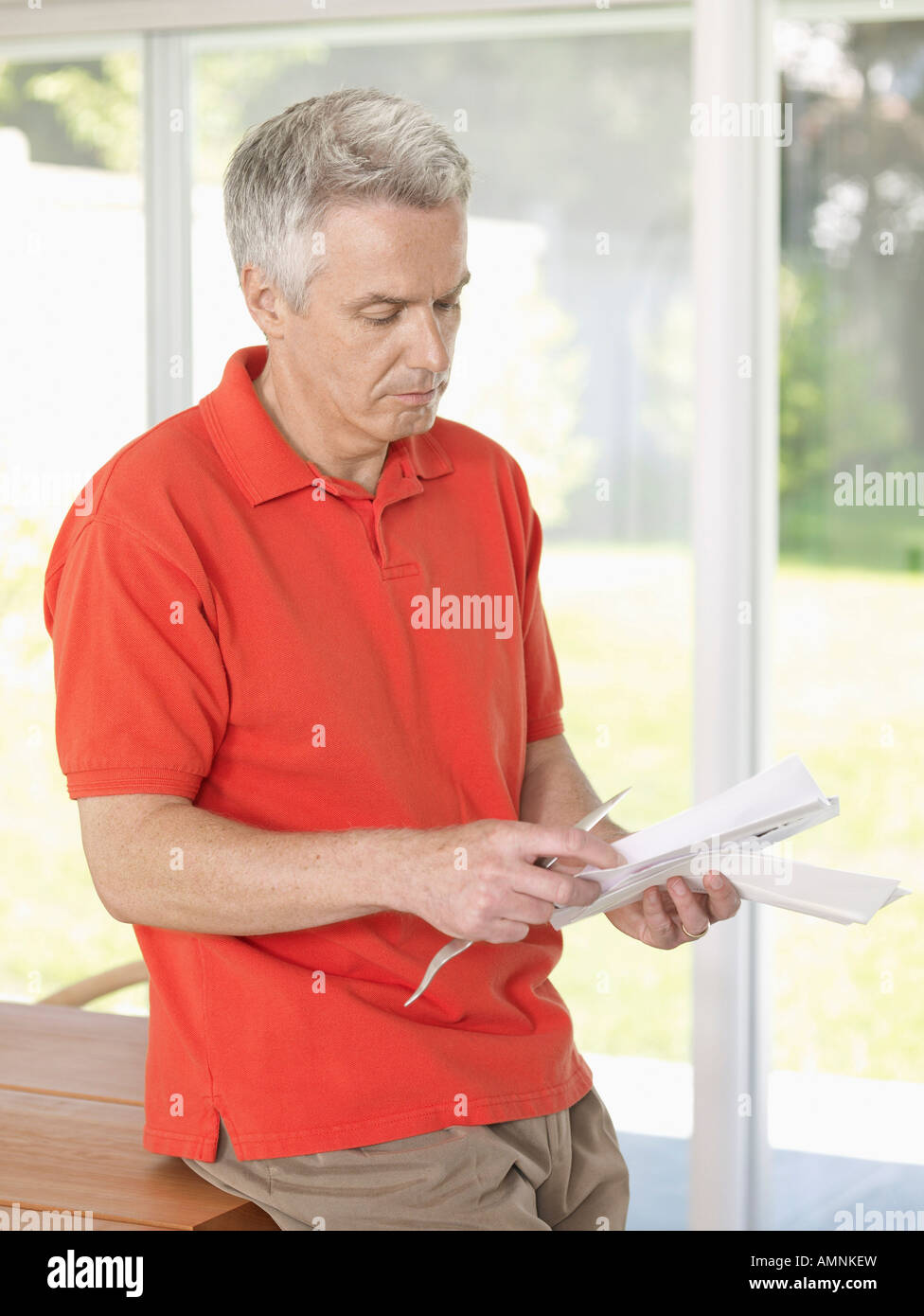 Man Holding Envelope Stock Photo - Alamy