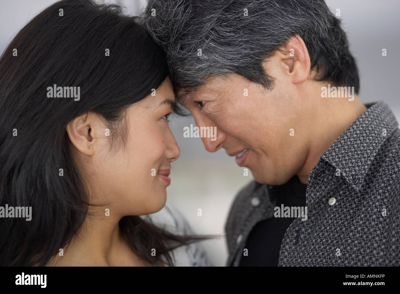Portrait of Couple Face to Face Stock Photo - Alamy