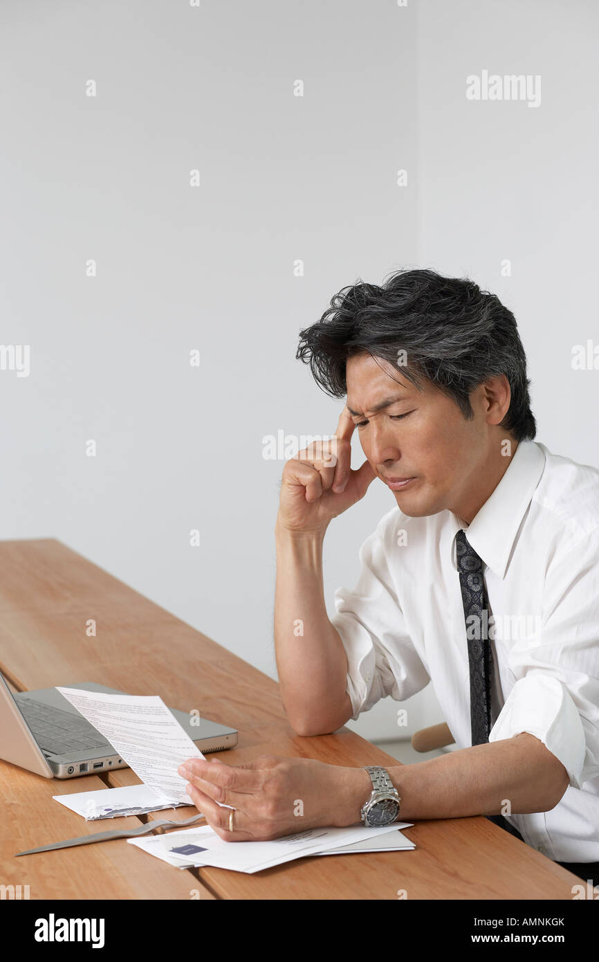 Man Paying Bills Stock Photo - Alamy
