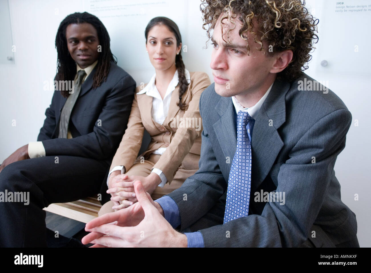 Group of office workers sitting down Stock Photo - Alamy
