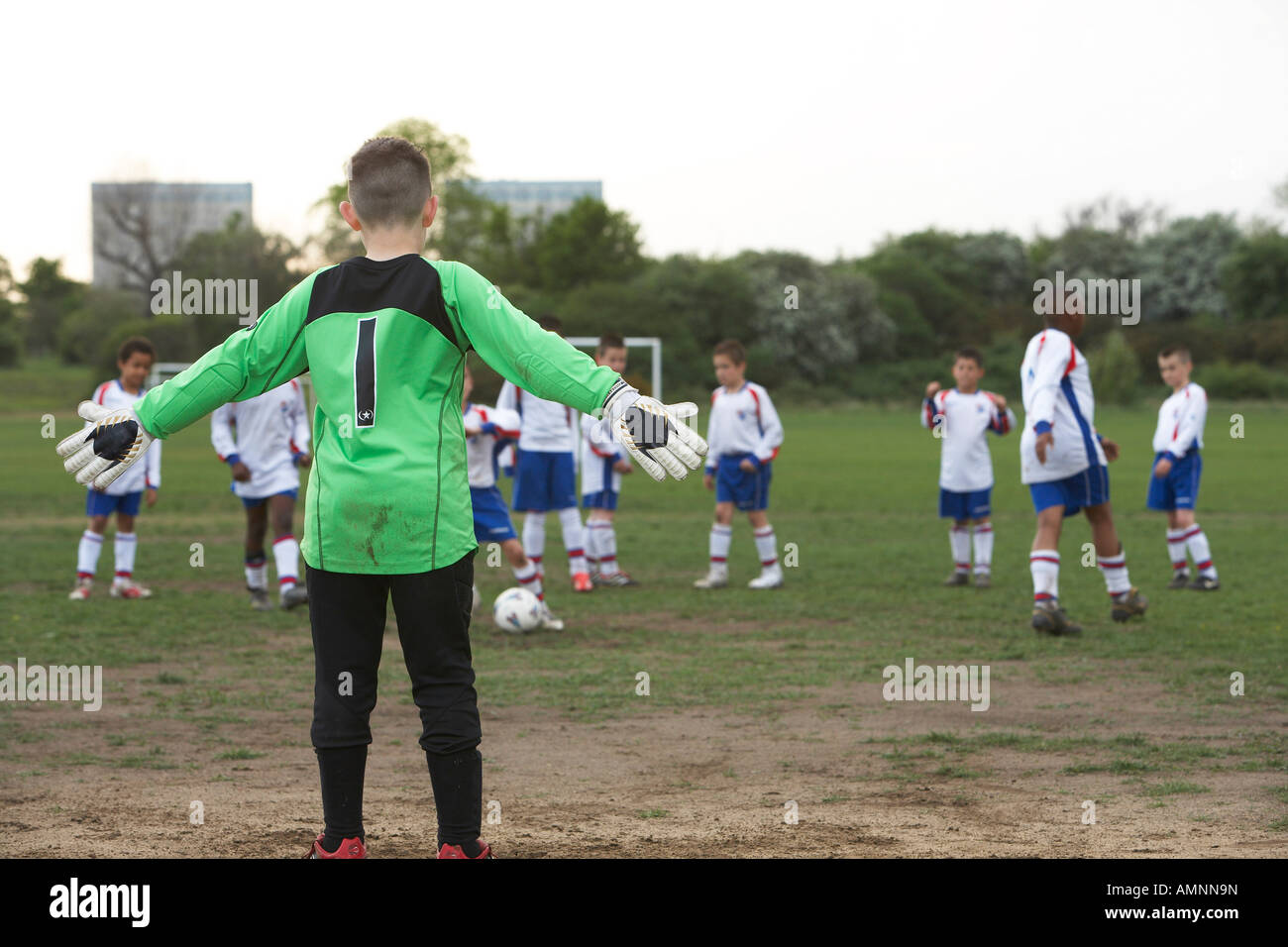 Boy soccer player back shot hi-res stock photography and images - Alamy