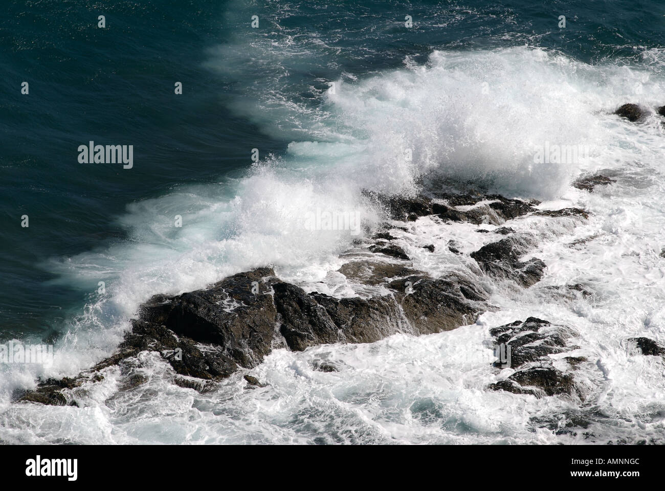 Powerful waves hit rugged rocks hi-res stock photography and images - Alamy