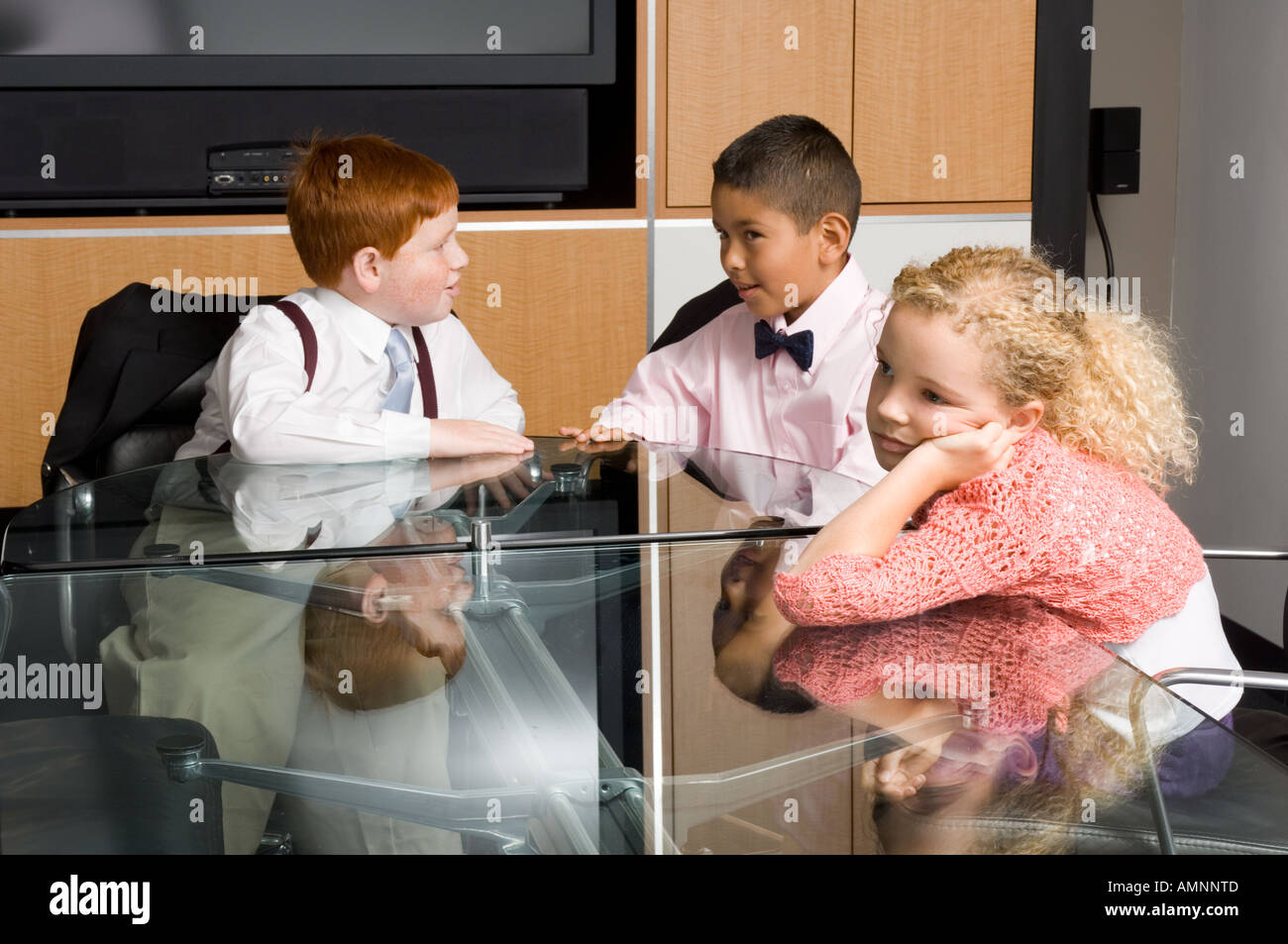 Young business children in office meeting Stock Photo - Alamy