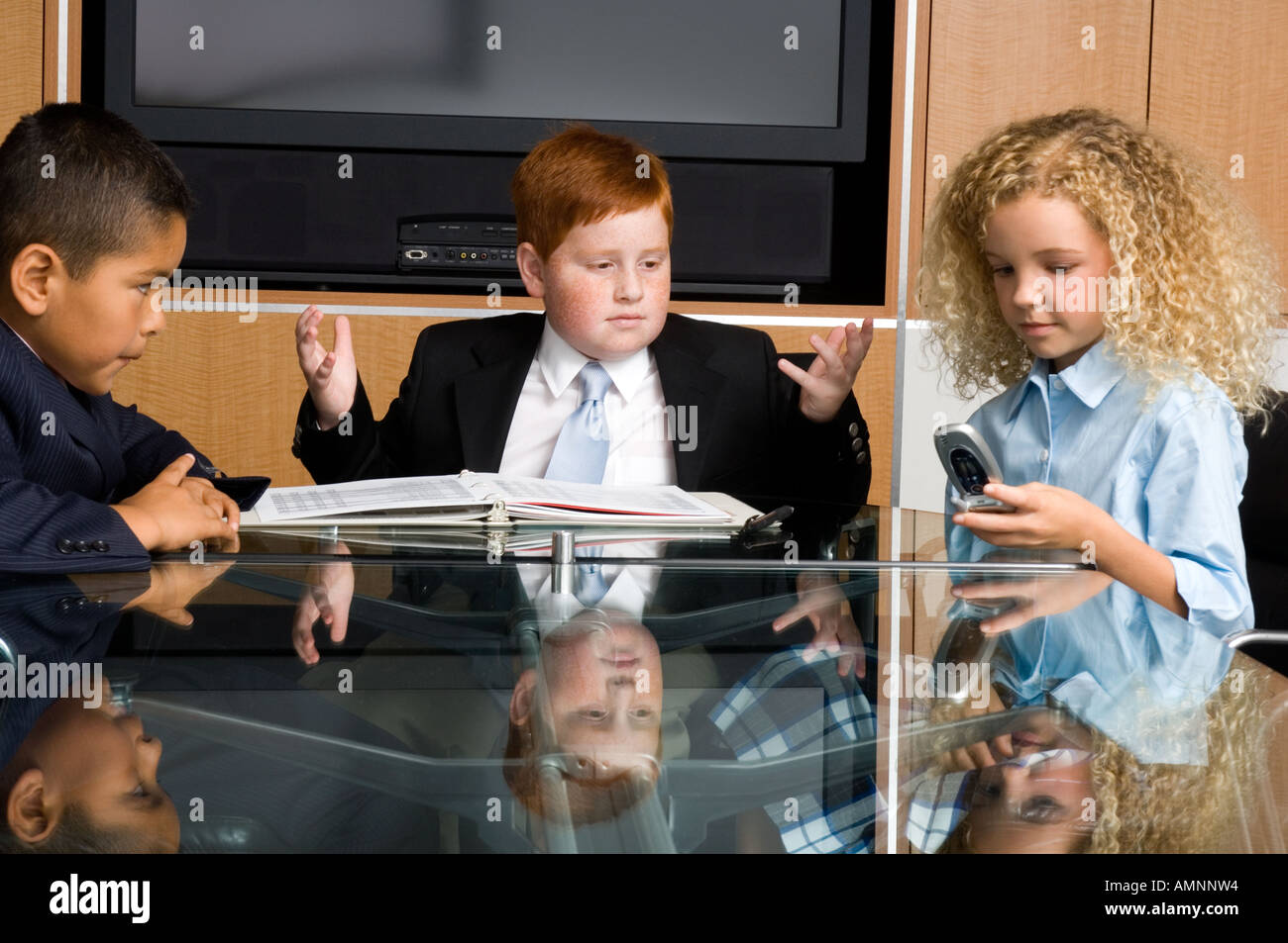 Young business children in office meeting Stock Photo - Alamy