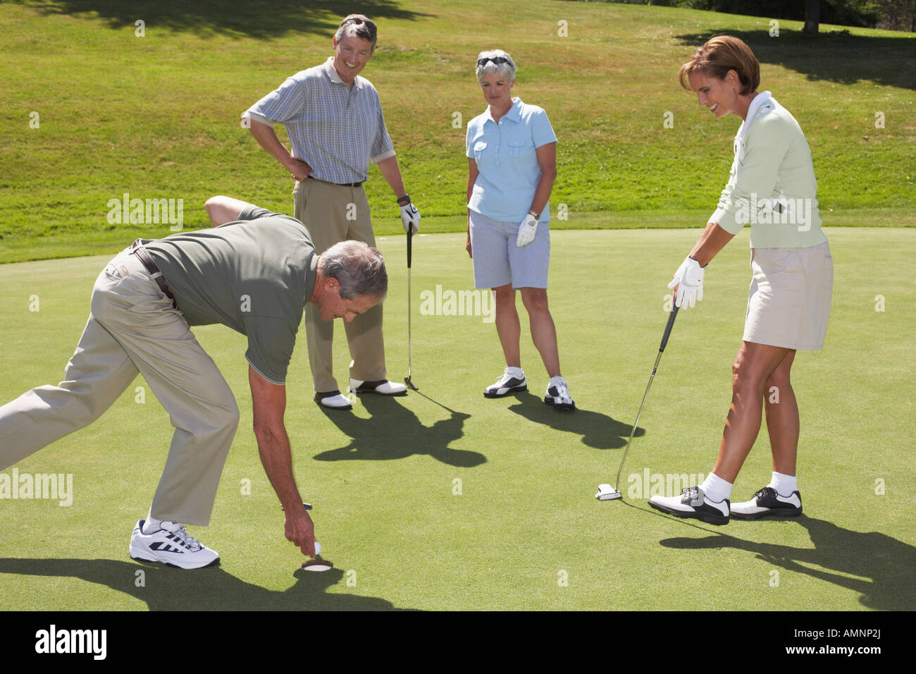 Reaching golf hi-res stock photography and images - Alamy