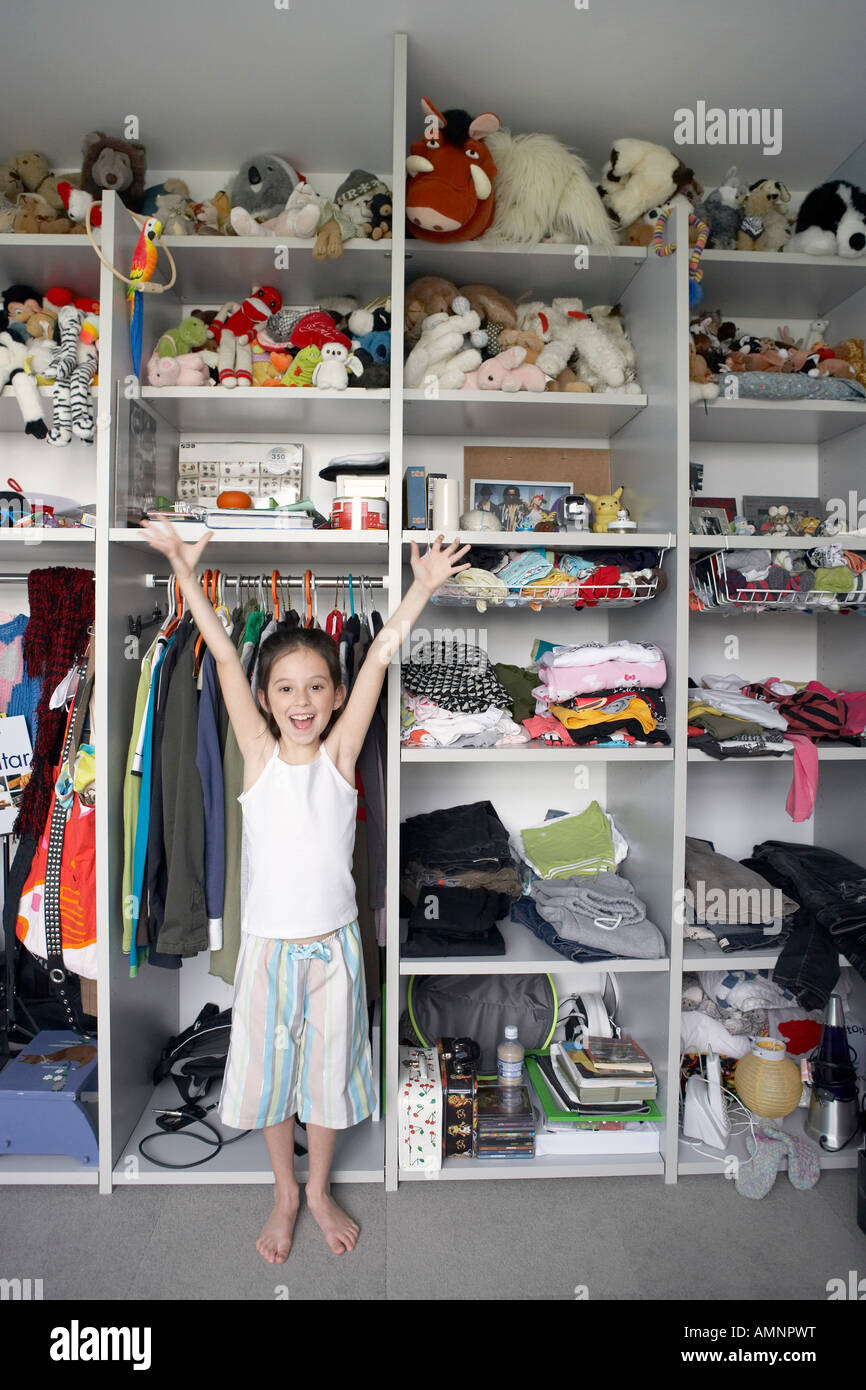 Girl Standing in Front of Closet Stock Photo - Alamy
