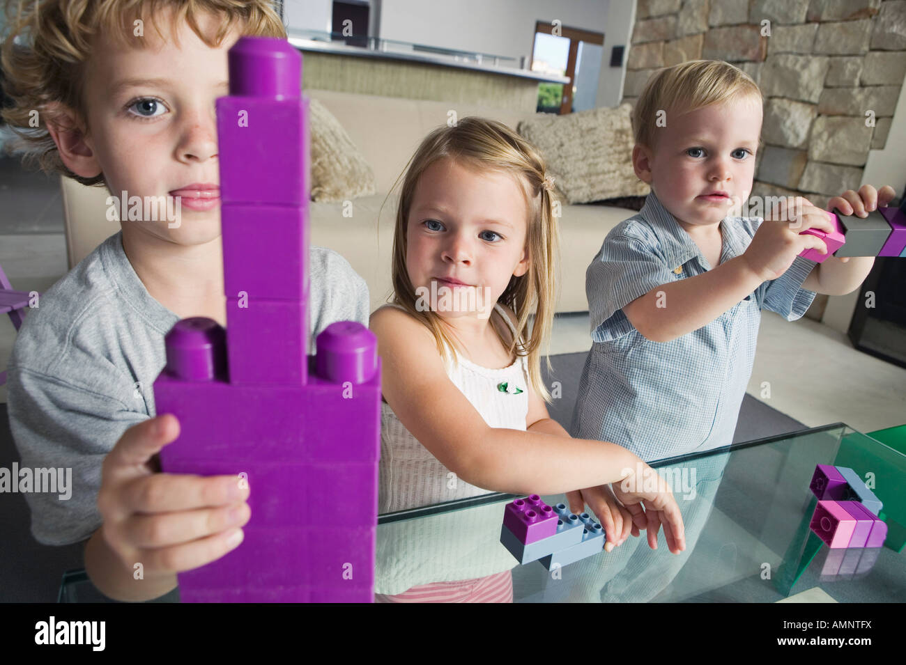 Children Playing with Building Blocks Stock Photo - Alamy