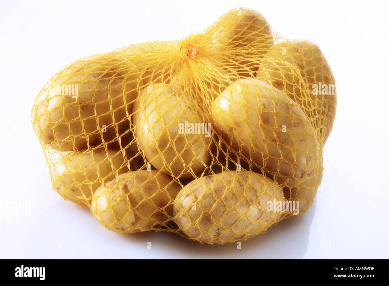 Potatoes in net Stock Photo - Alamy