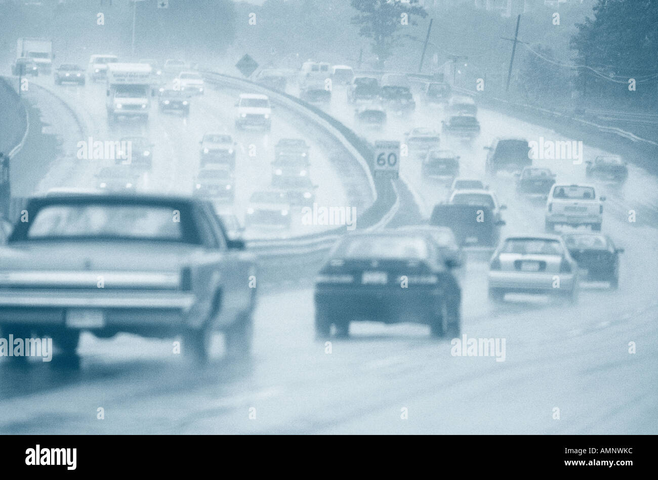 Traffic in Rain Stock Photo - Alamy