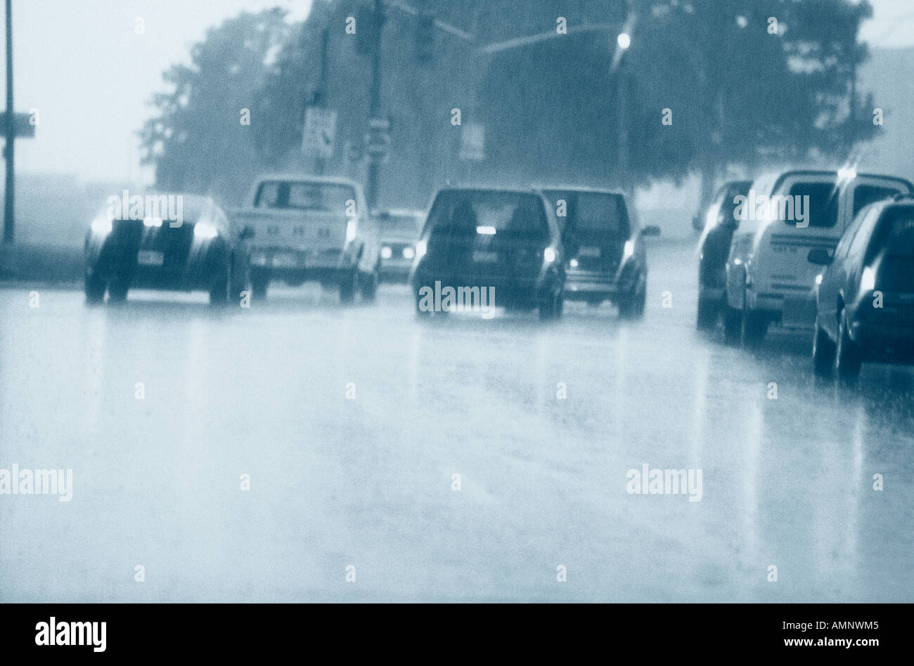 Traffic in Rain Stock Photo - Alamy